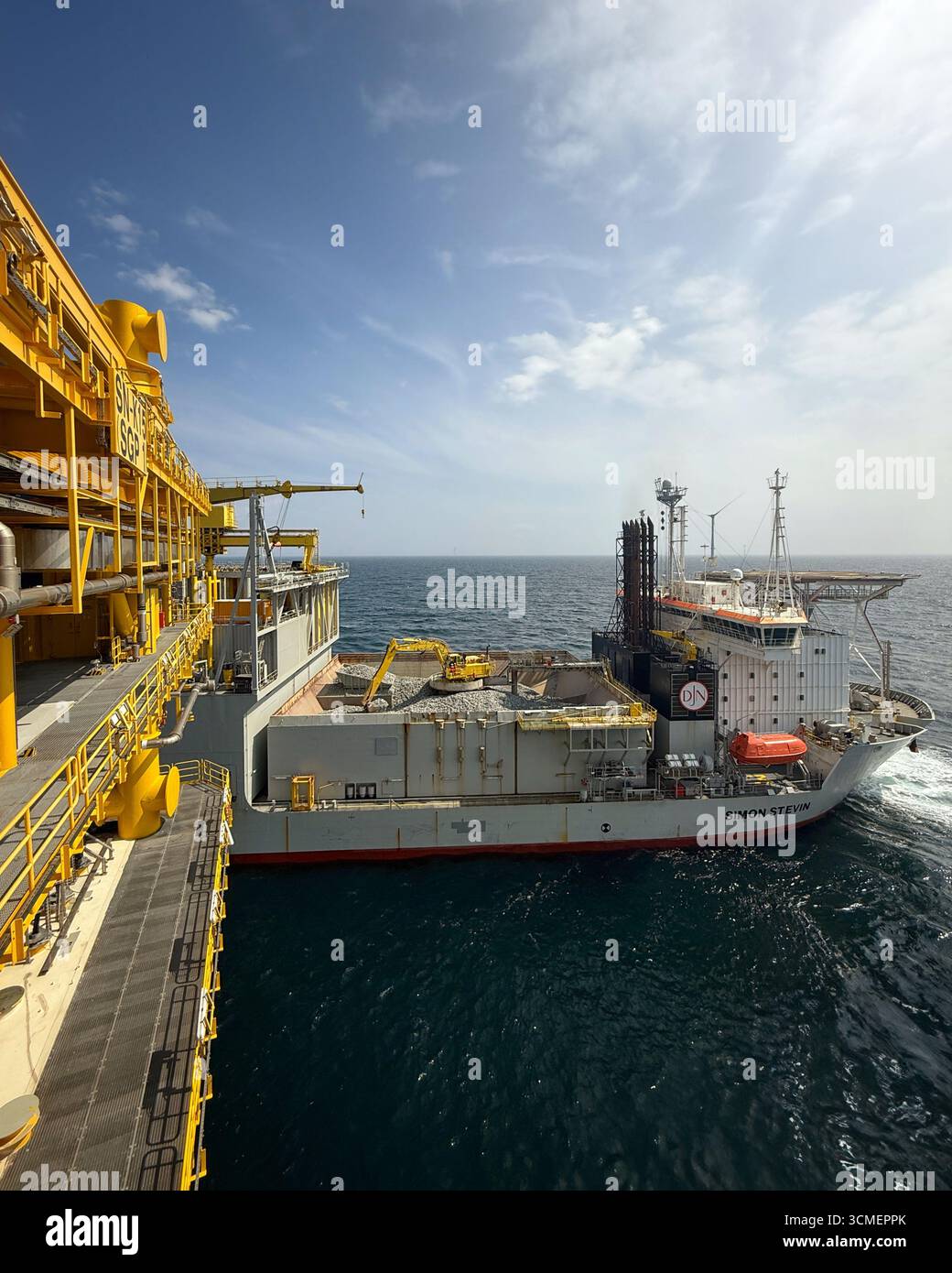 Fallpipe vessel Simon Stevin at offshore wind farm, placing rock for subsea cable protection and ...