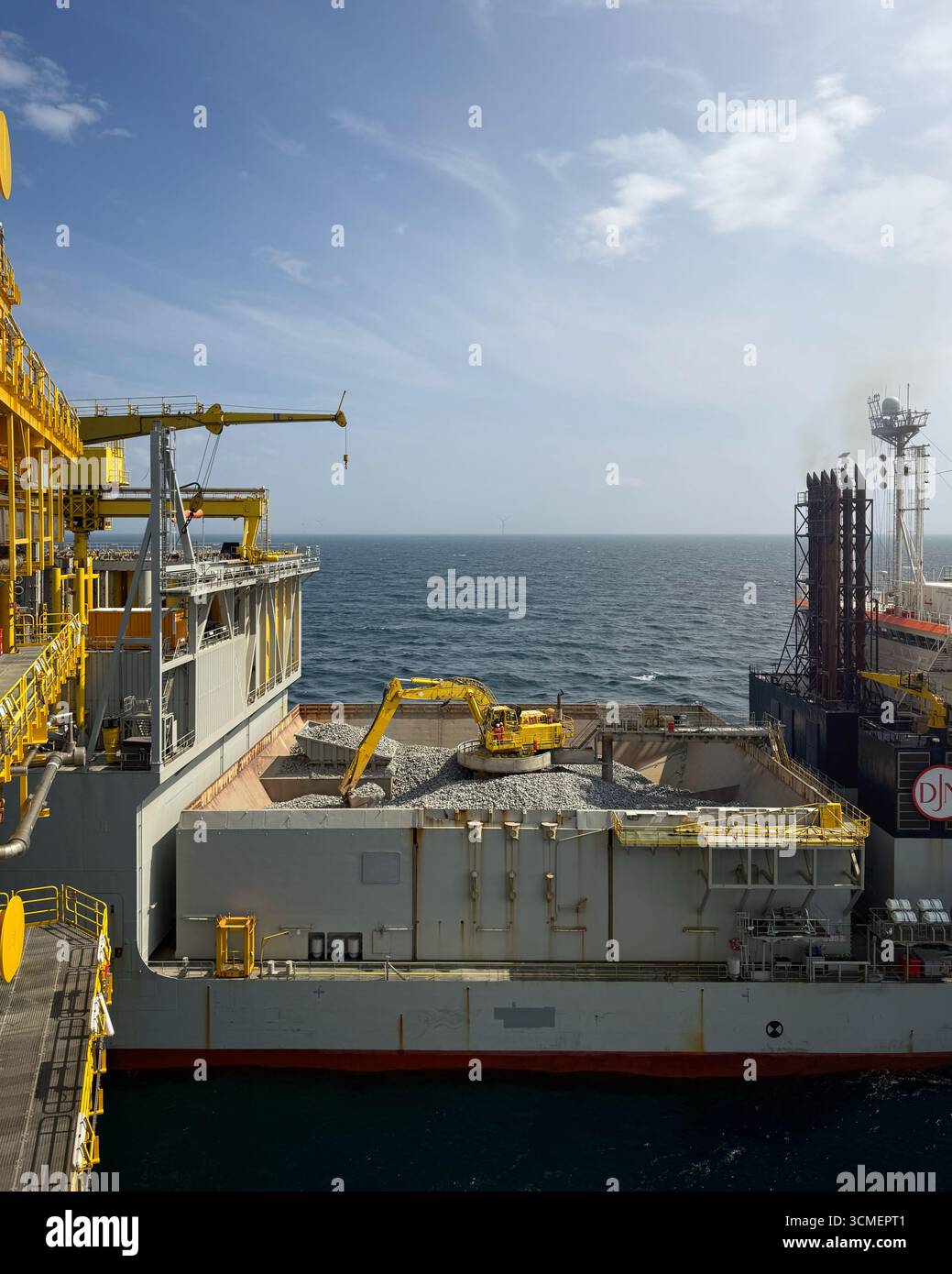 Fallpipe vessel Simon Stevin at offshore wind farm, placing rock for subsea cable protection and ...