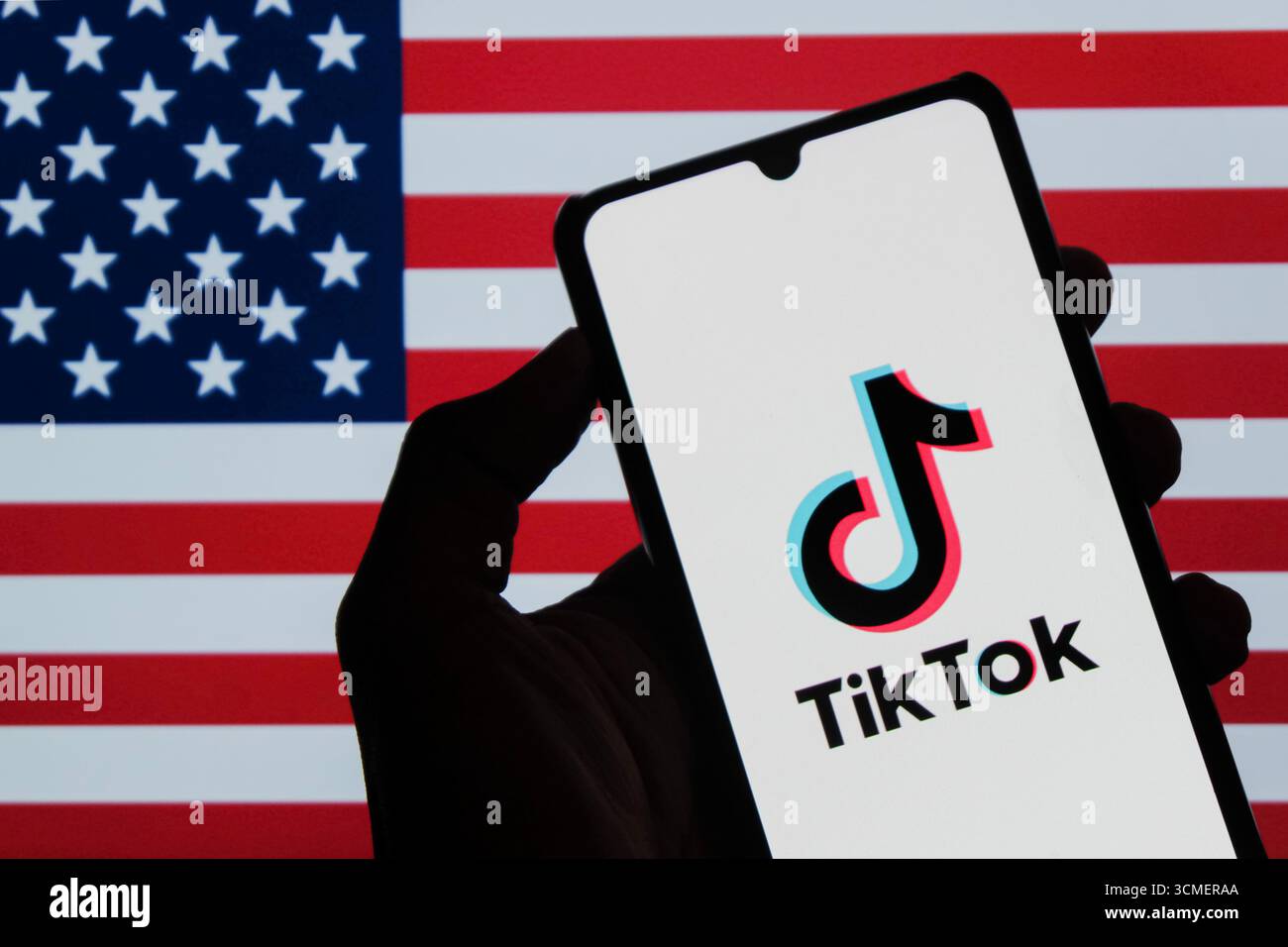 In this photo illustration, a TikTok logo is seen displayed on a ...