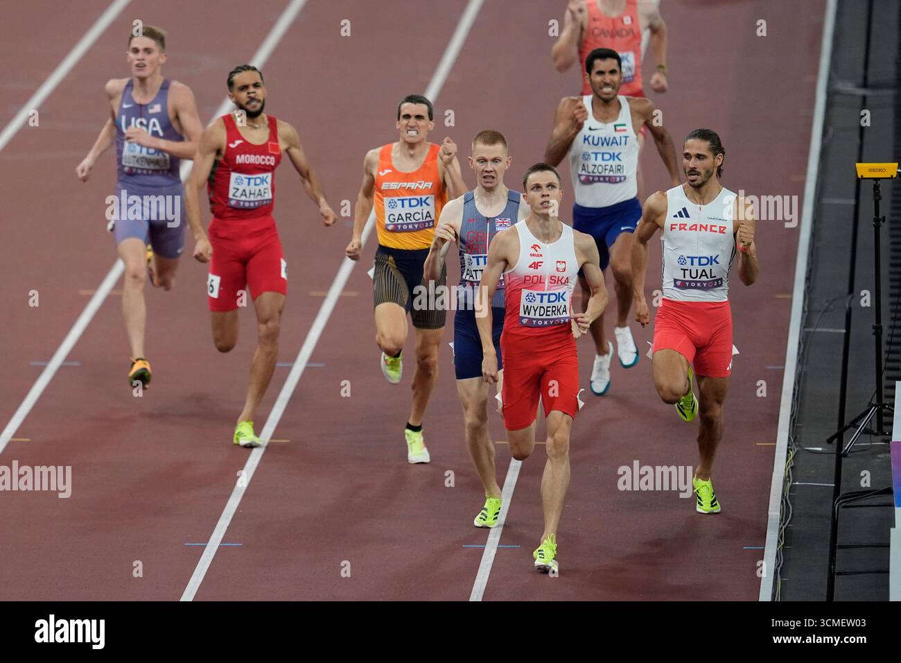 Poland's Maciej Wyderka competes with France's Gabriel Tual, right, and ...