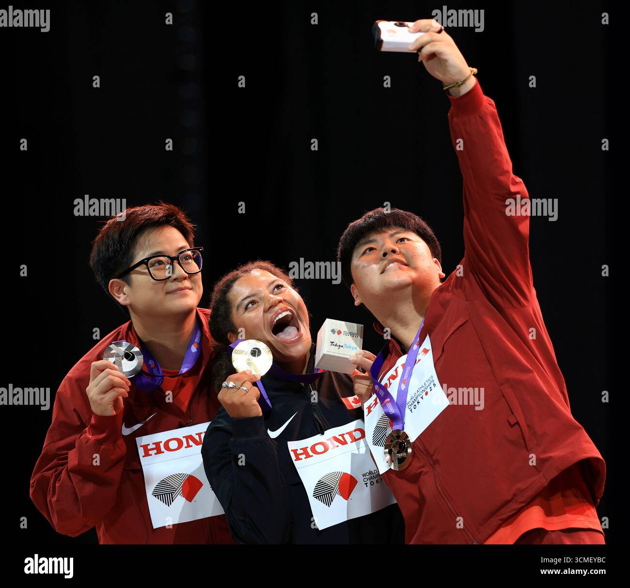 (L-R) Jie ZHAO of China, silver, Camryn ROGERS of Canada, gold, and ...