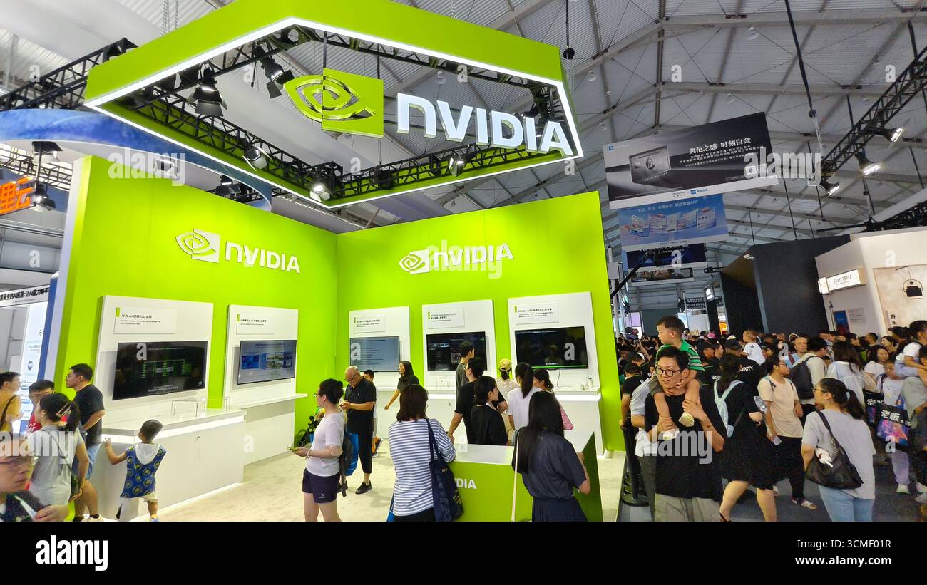 SHANGHAI, CHINA - SEPTEMBER 13, 2025 - Tourists visit the NVIDIA booth ...