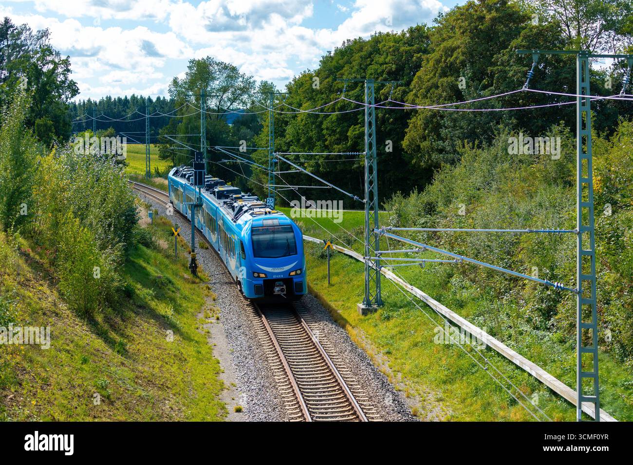 Bavaria, Germany - September 15, 2025: A blue Arverio regional train ...