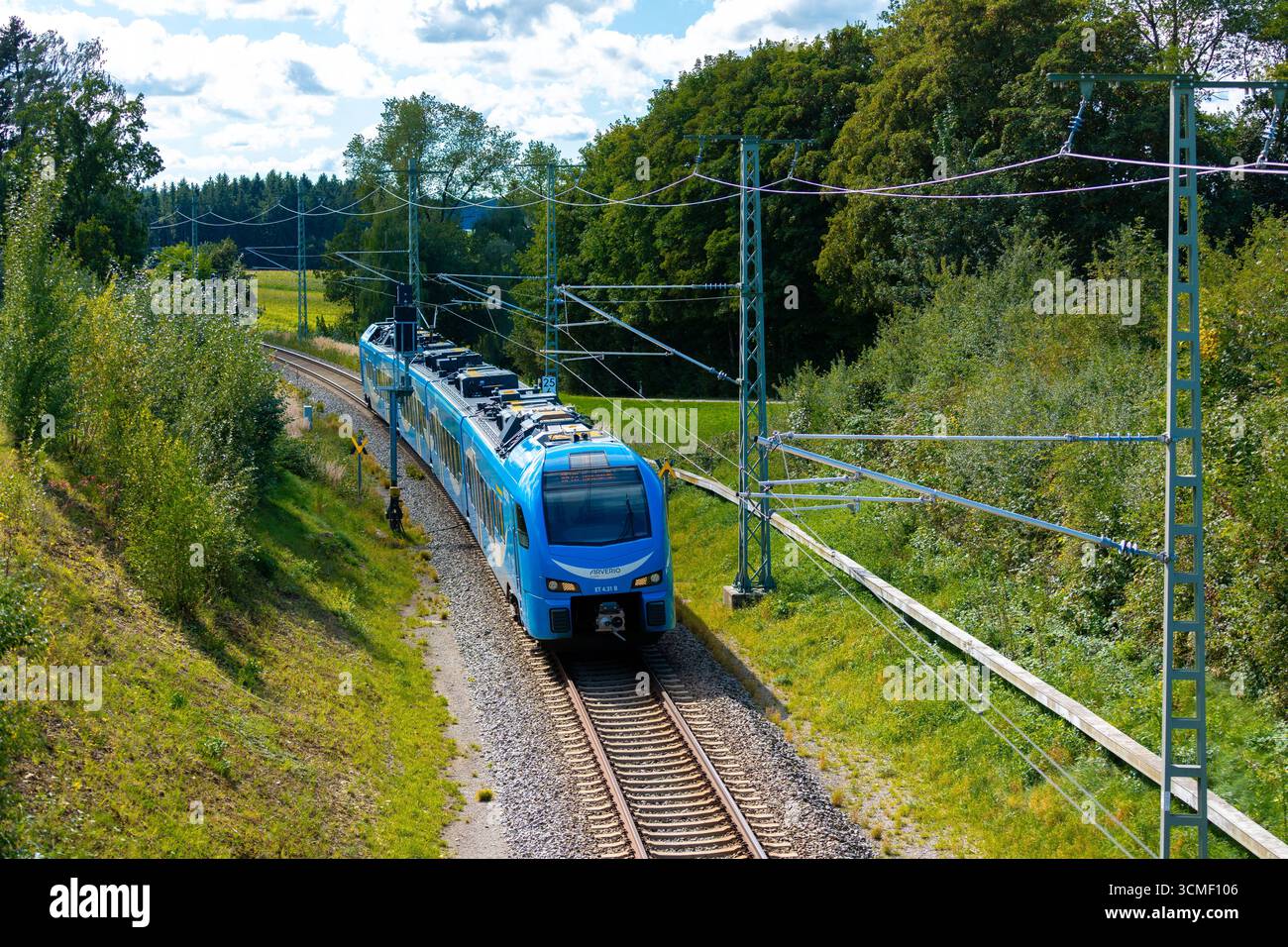 Bavaria, Germany - September 15, 2025: A blue Arverio regional train ...