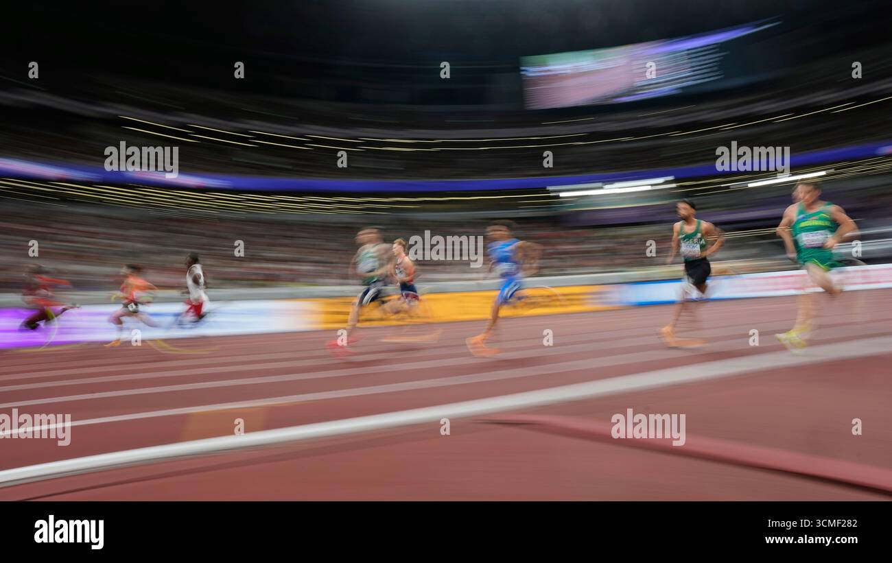 Runners compete in a men's 800 meters heat at the World Athletics ...