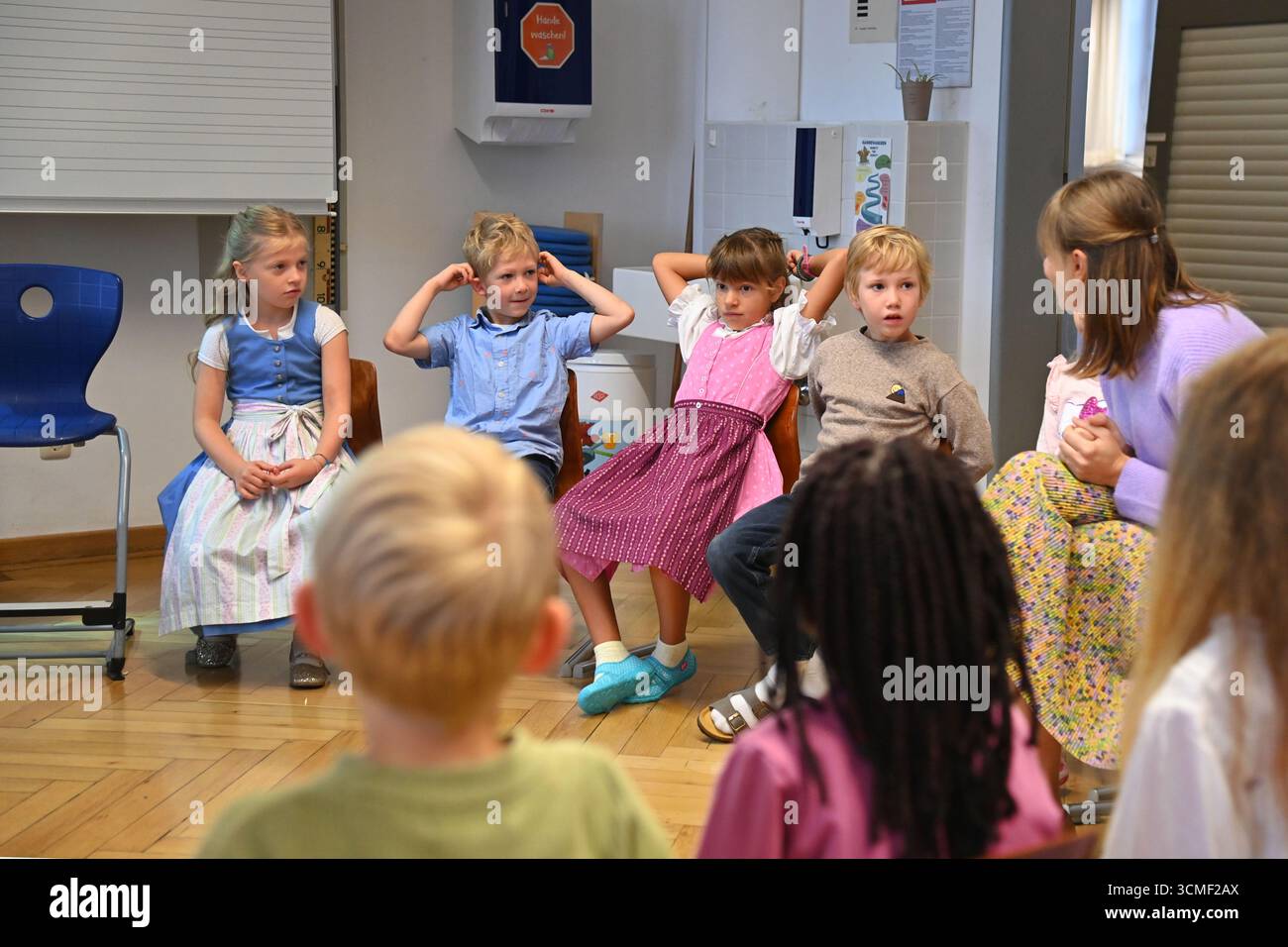 School lessons in a 2nd grade class, children, students, class group ...