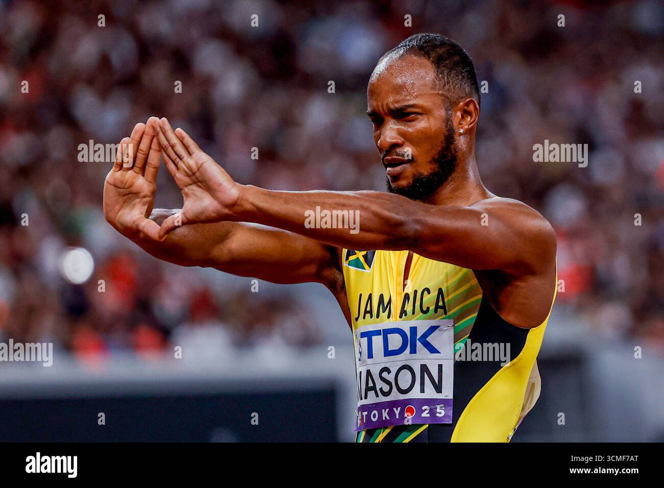 Tyler Mason of Jamaica celebrates after competing in the Men's 110 ...