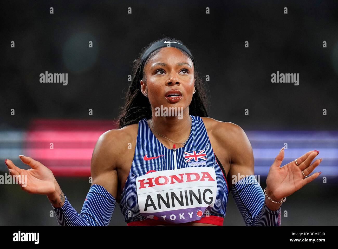 Britain's Amber Anning reacts after finishing a women's 400 meters ...