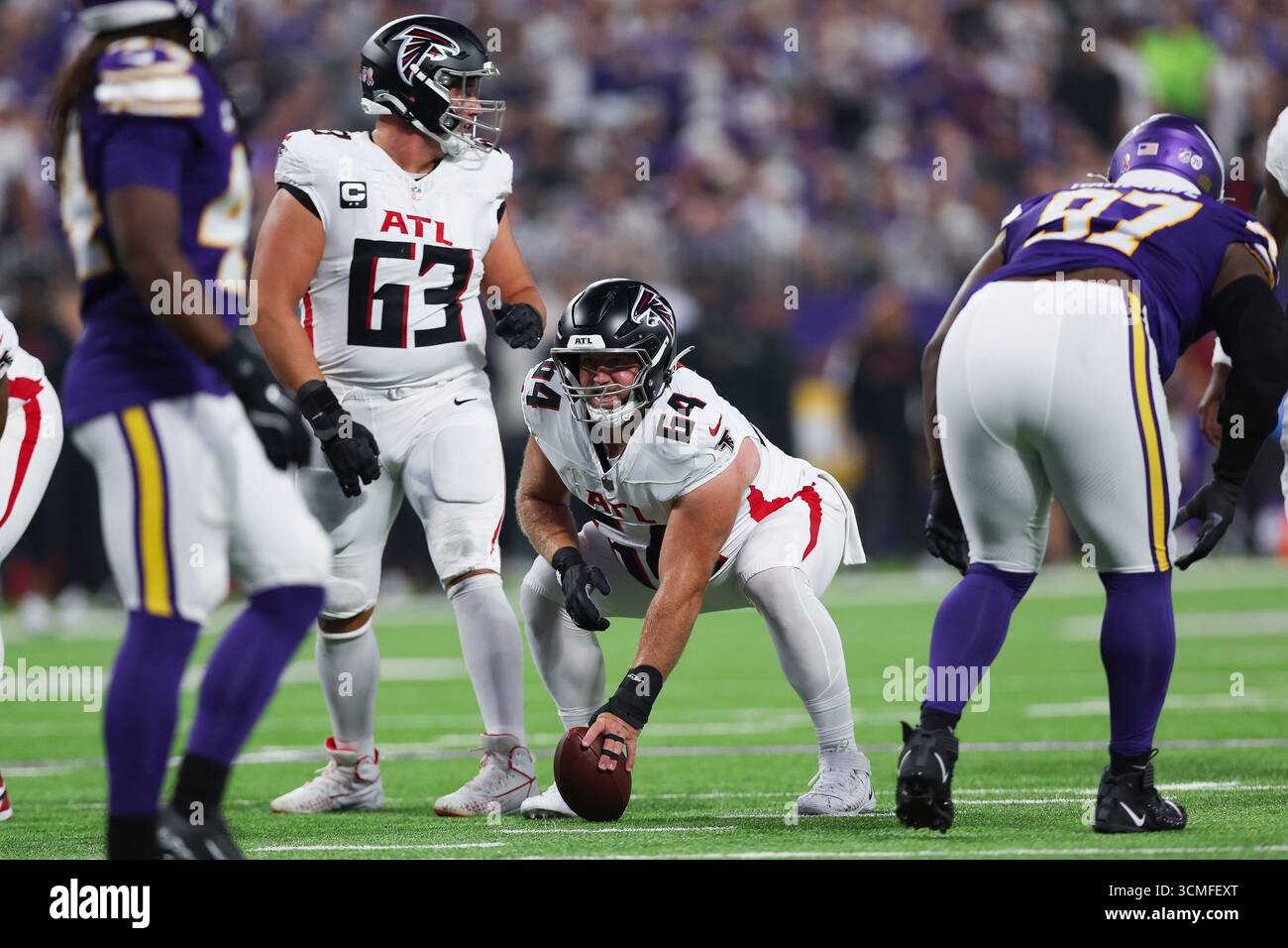 Atlanta Falcons guard Ryan Neuzil (64) lines up for a play against the ...