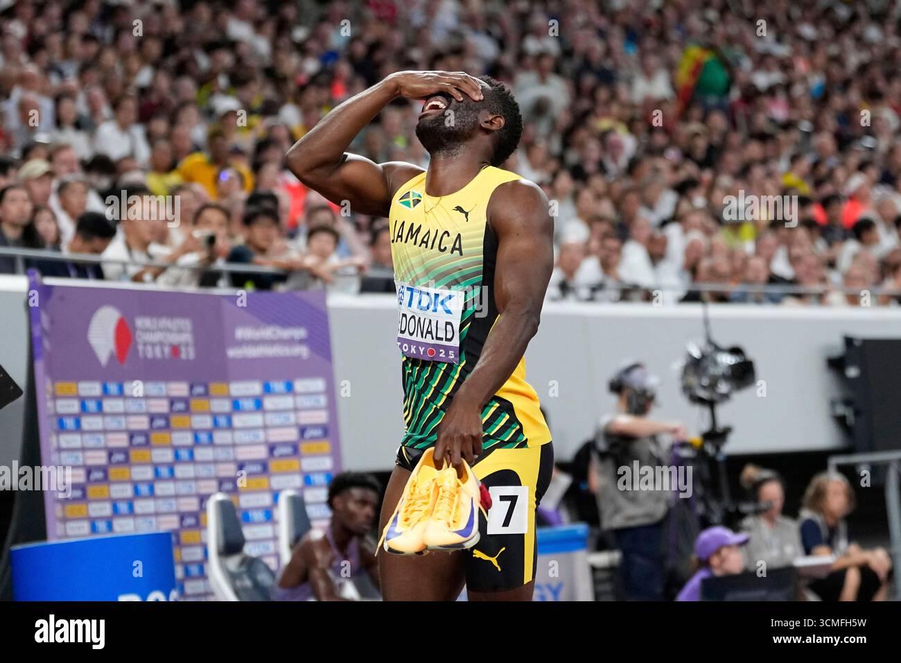 Jamaica's Rusheen McDonald reacts after finishing a men's 400 meters ...