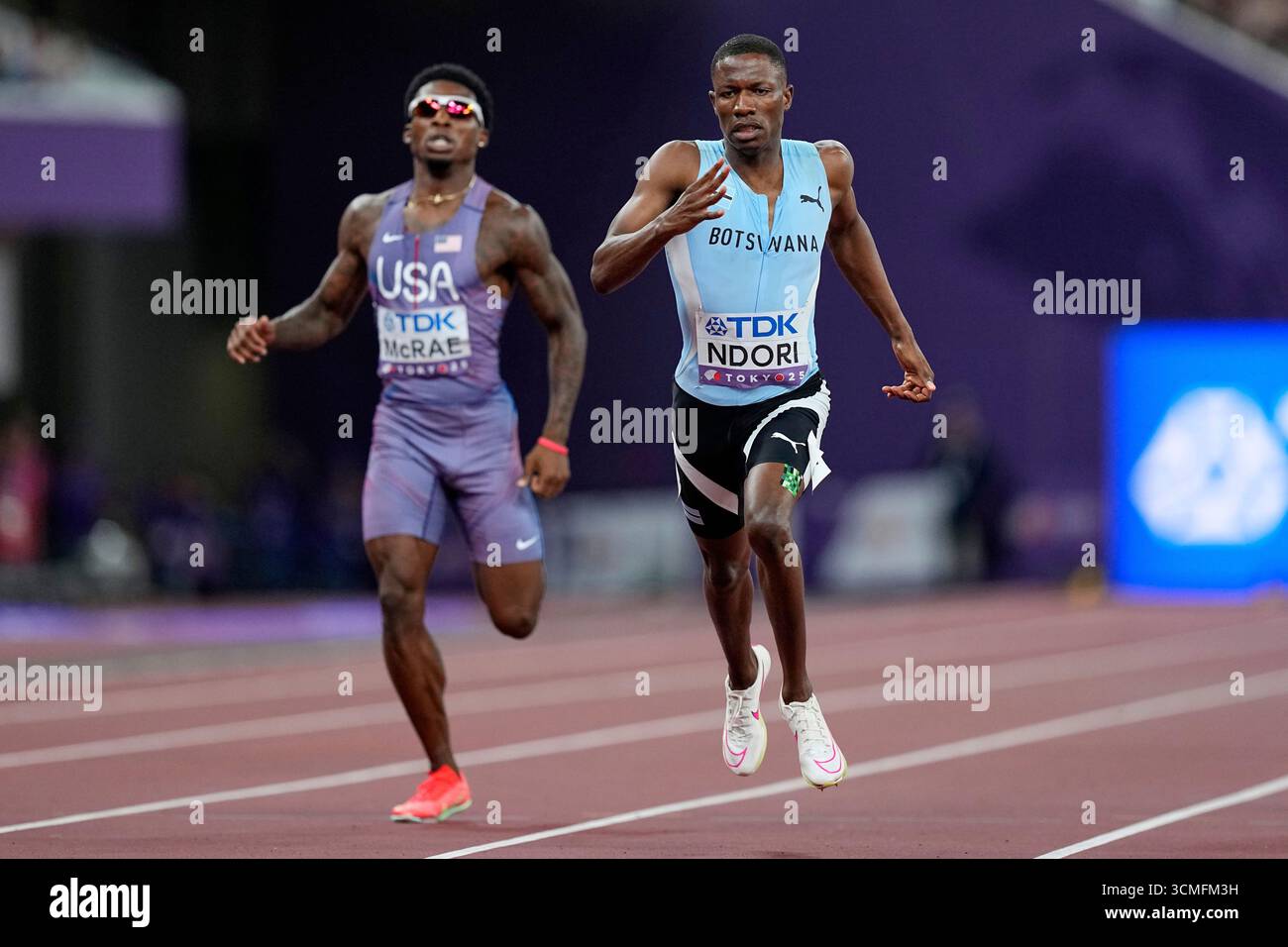 Botswana's Bayapo Ndori and United States' Khaleb McRae race in a men's ...