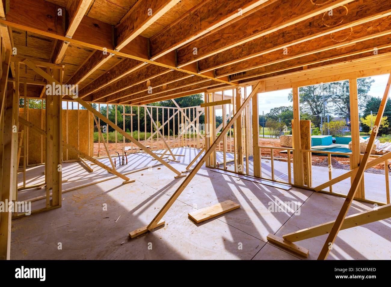 Wooden framing is being constructed, support beams of building ...