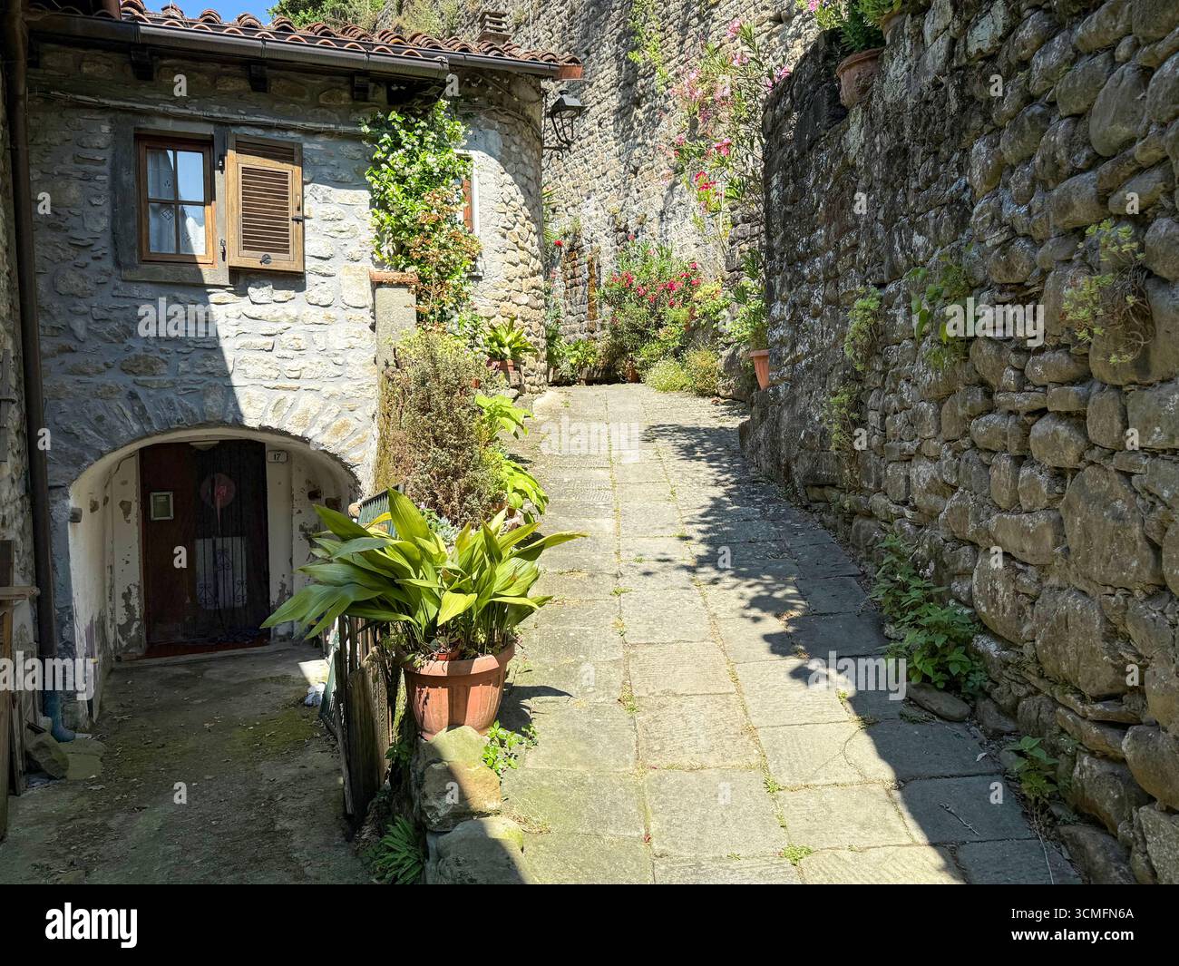 One of the narrow residential cobbled-stone medieval streets at ...