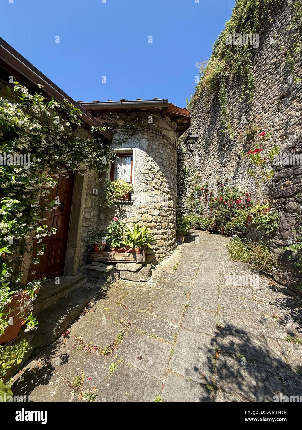 One of the narrow residential cobbled-stone medieval streets at ...