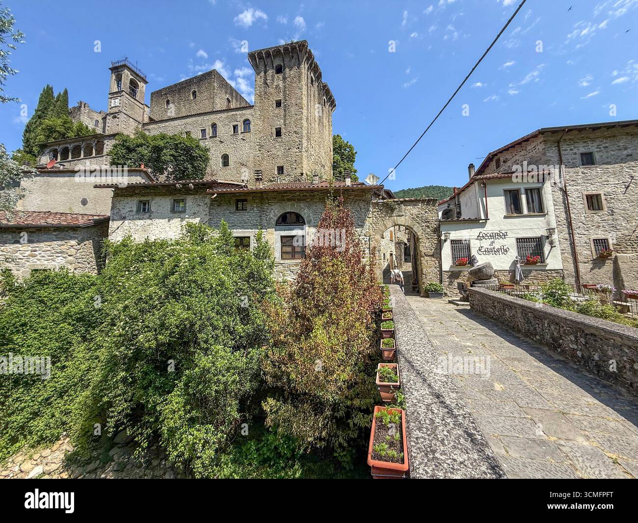 Across the main bridge over a narrow river towards the main arch ...
