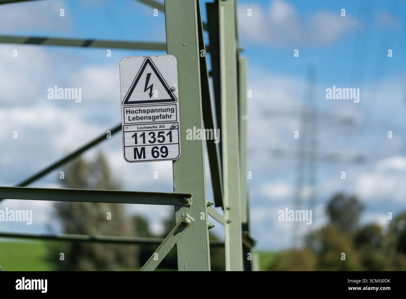 Bavaria, Germany - September 15, 2025: A warning sign on a high-voltage ...
