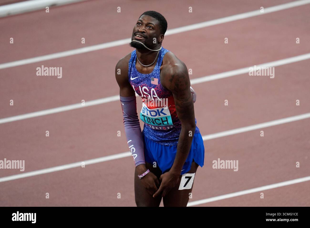 United States' Cordell Tinch celebrates after winning the men's 110 ...
