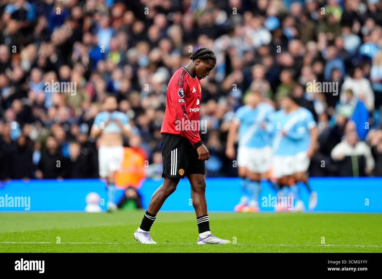 Manchester United's Patrick Dorgu dejectged following Manchester City's ...