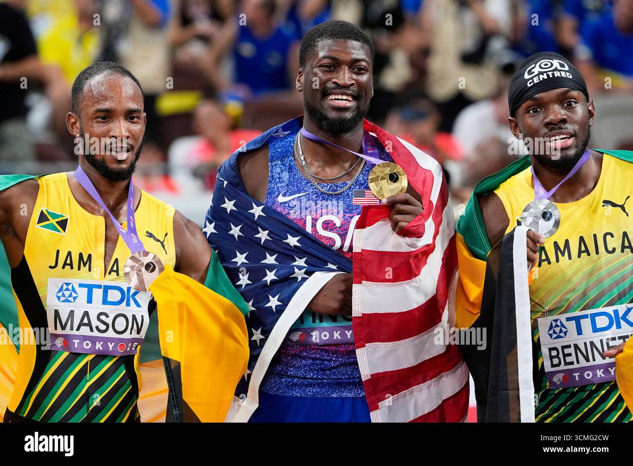 Gold medalist United States' Cordell Tinch, centre, is pictured with ...