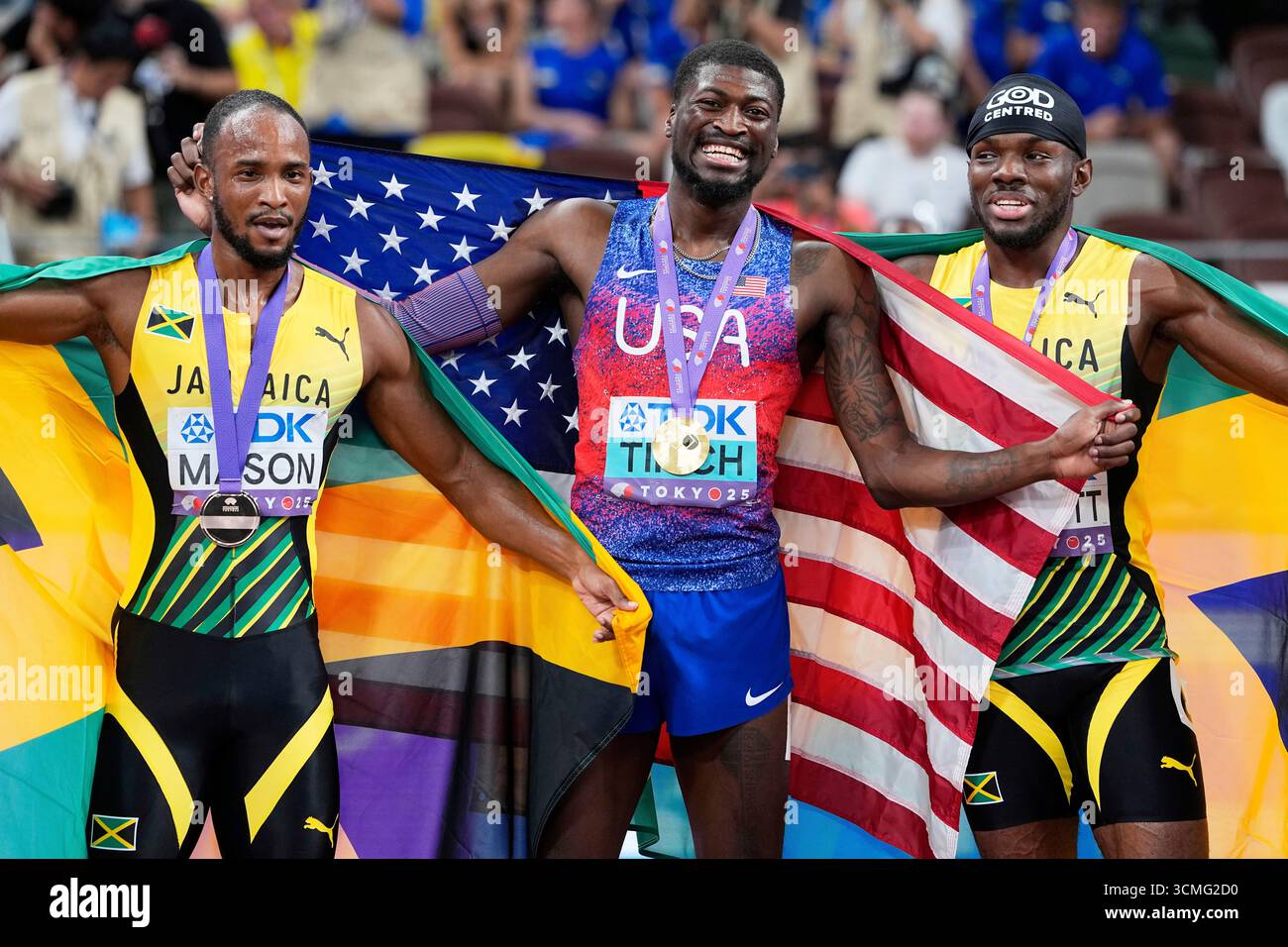 Gold medalist United States' Cordell Tinch, centre, is pictured with ...