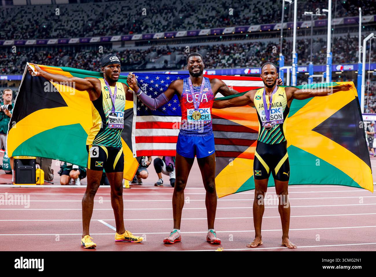 second finisher and silver medal Orlando Bennett of Jamaica and winner ...