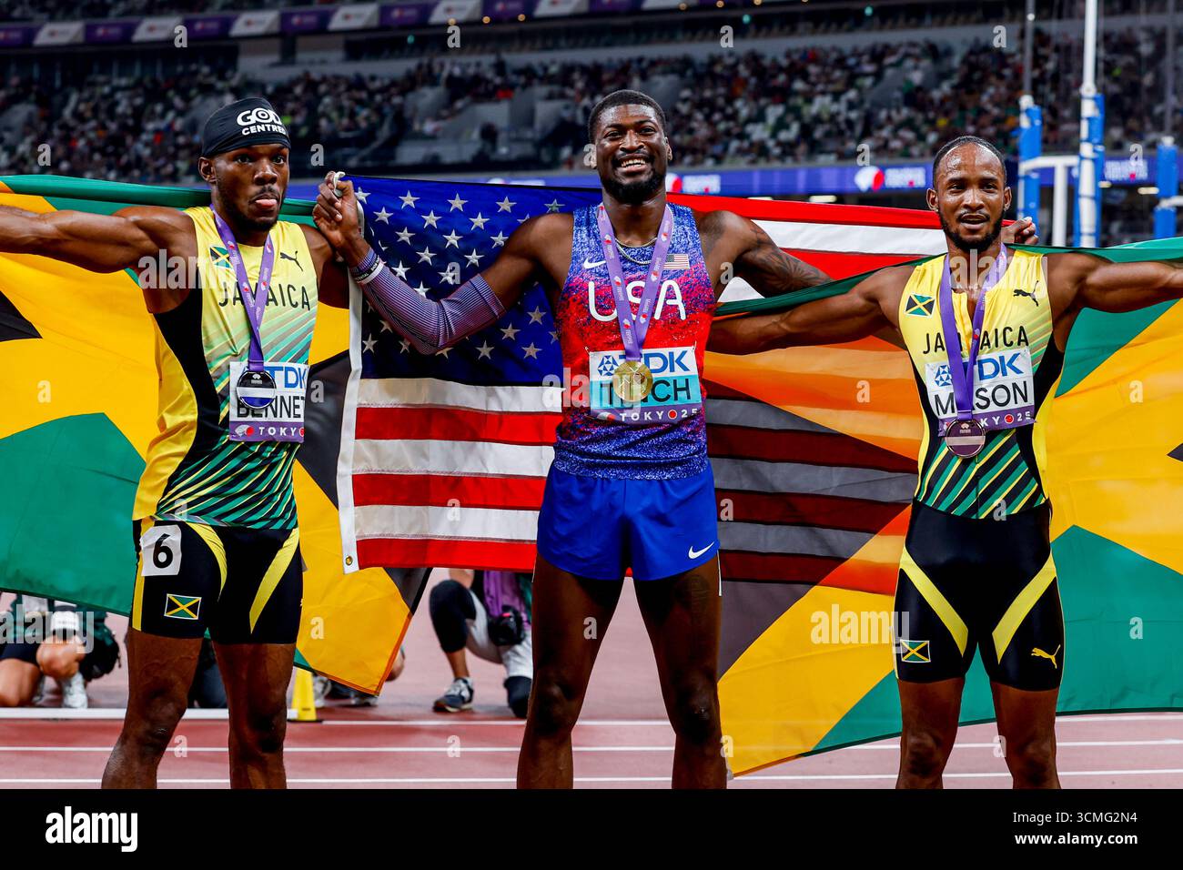 second finisher and silver medal Orlando Bennett of Jamaica and winner ...