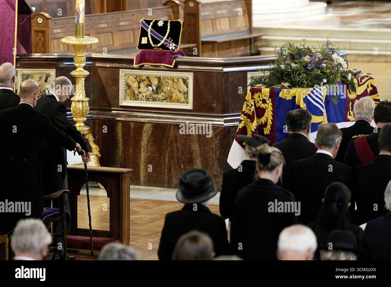 The Duke of Kent, third left, arrives as the coffin of the Duchess of ...