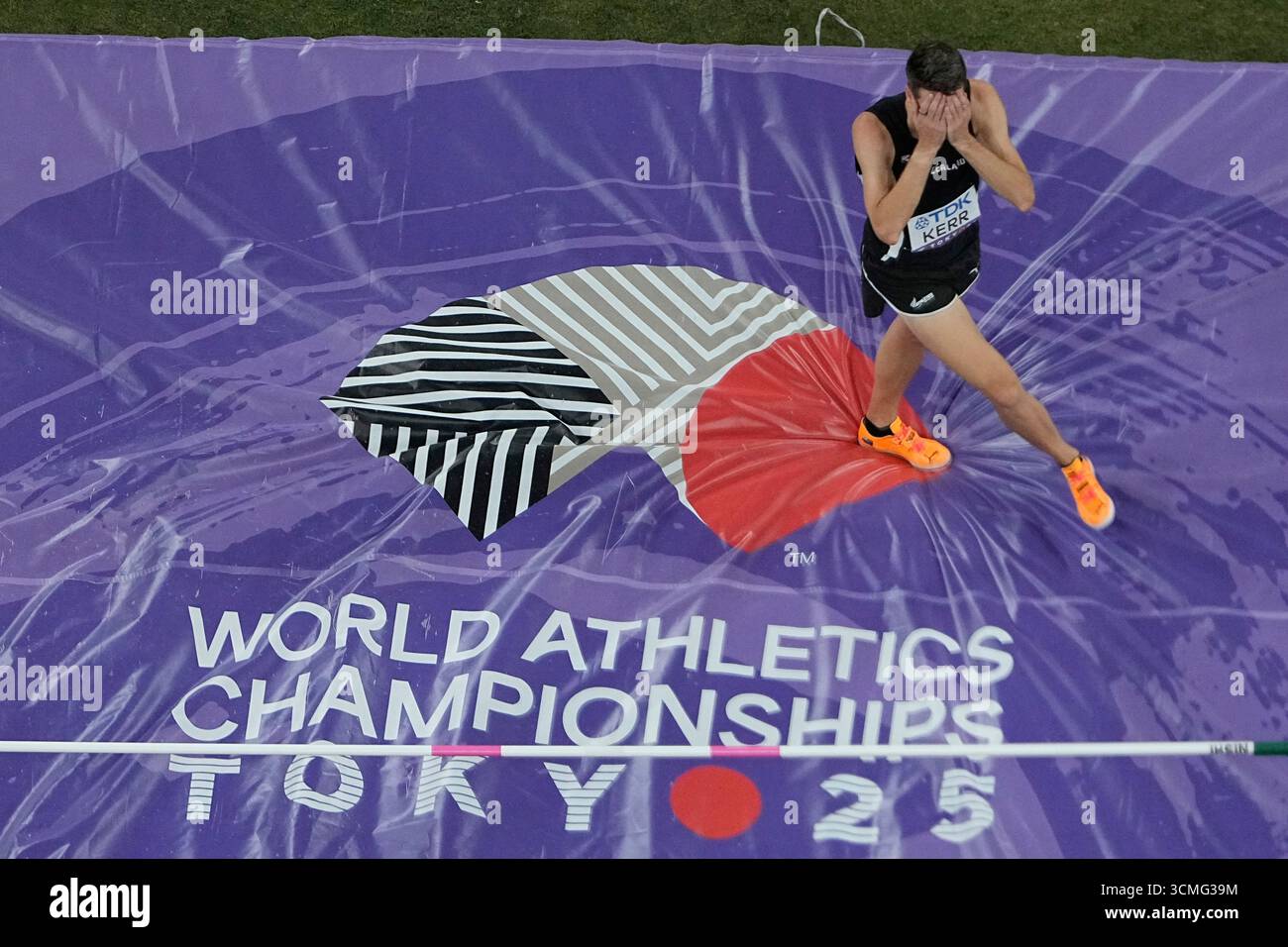 New Zealand's Hamish Kerr reacts after clearing the bar during the men ...