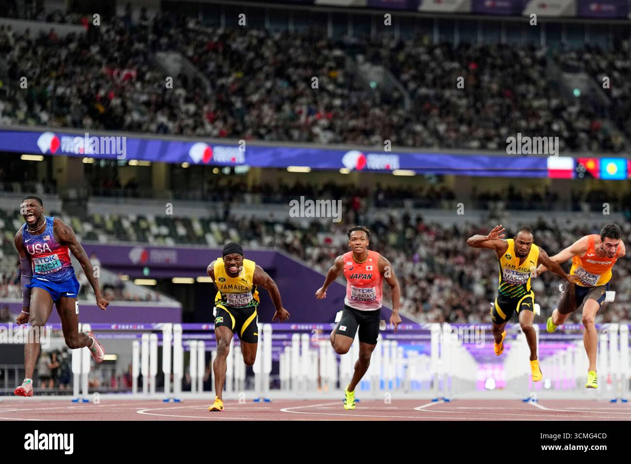 From left, United States' Cordell Tinch wins the gold ahead of Jamaica ...