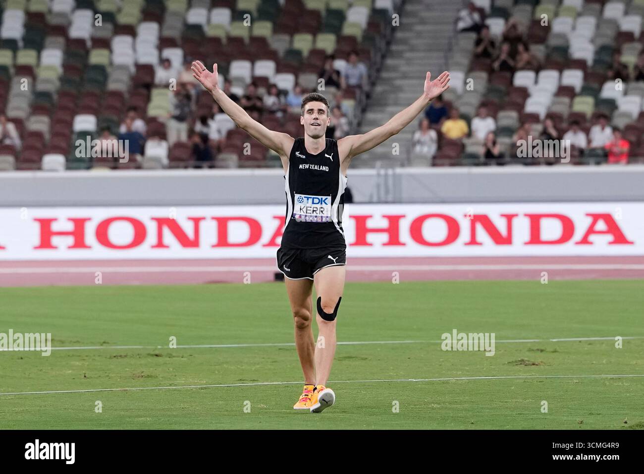 New Zealand's Hamish Kerr celebrates after winning the men's high jump ...