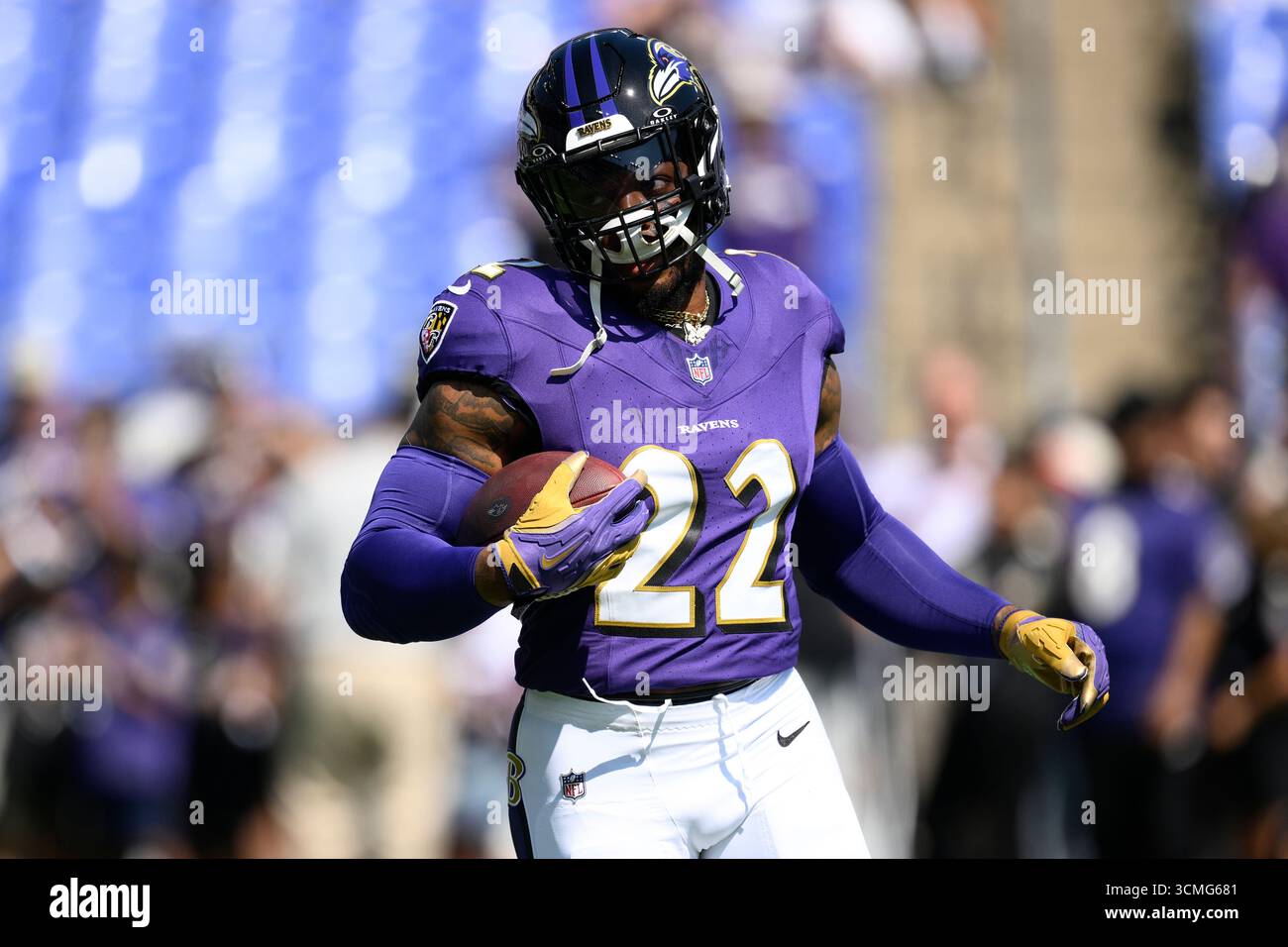 Baltimore Ravens running back Derrick Henry (22) warms up before an NFL ...