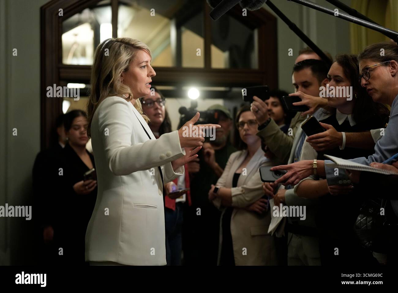 Industry Minister Joly Melanie speaks with media before attending ...