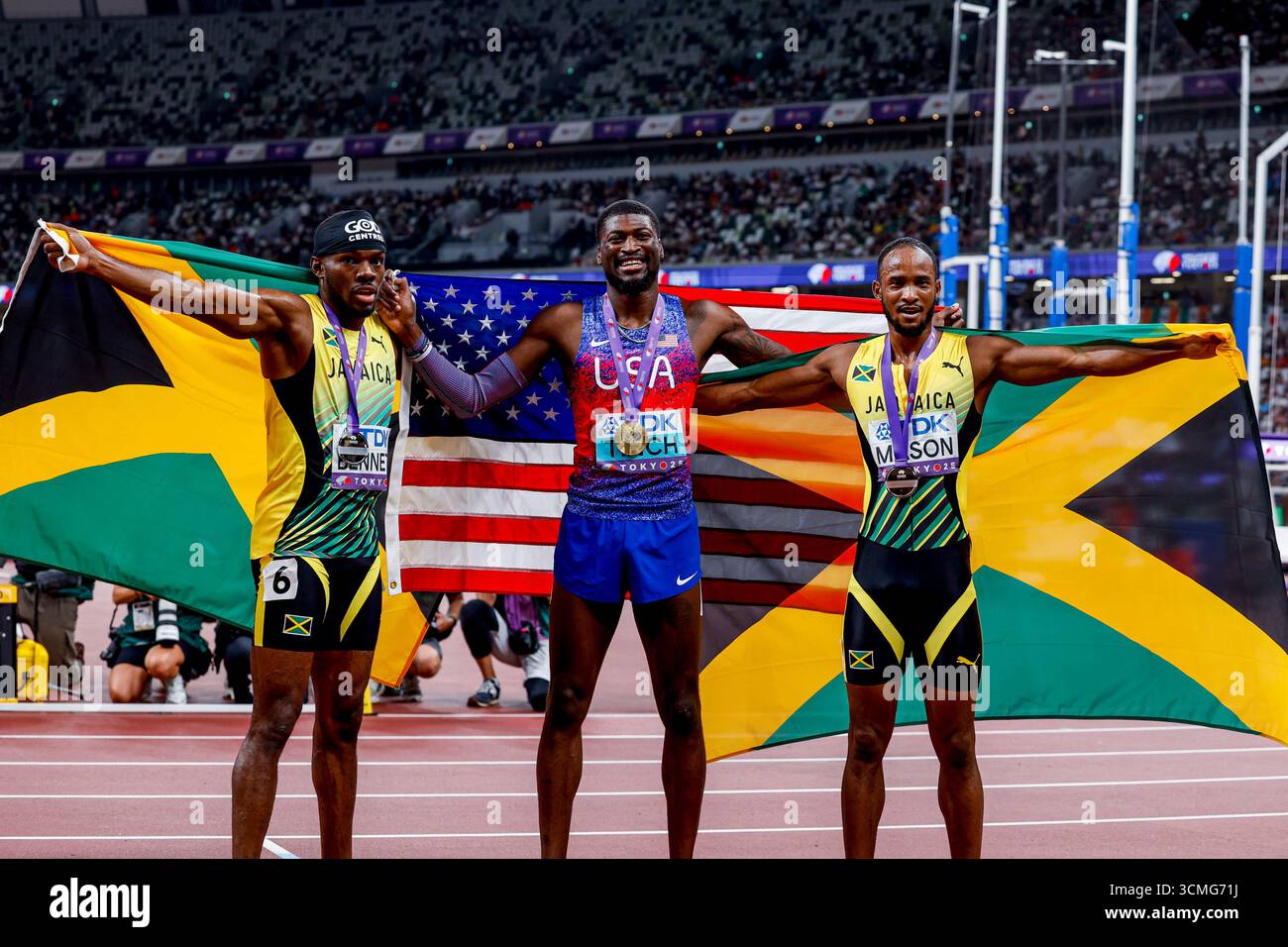 second finisher and silver medal Orlando Bennett of Jamaica and winner ...