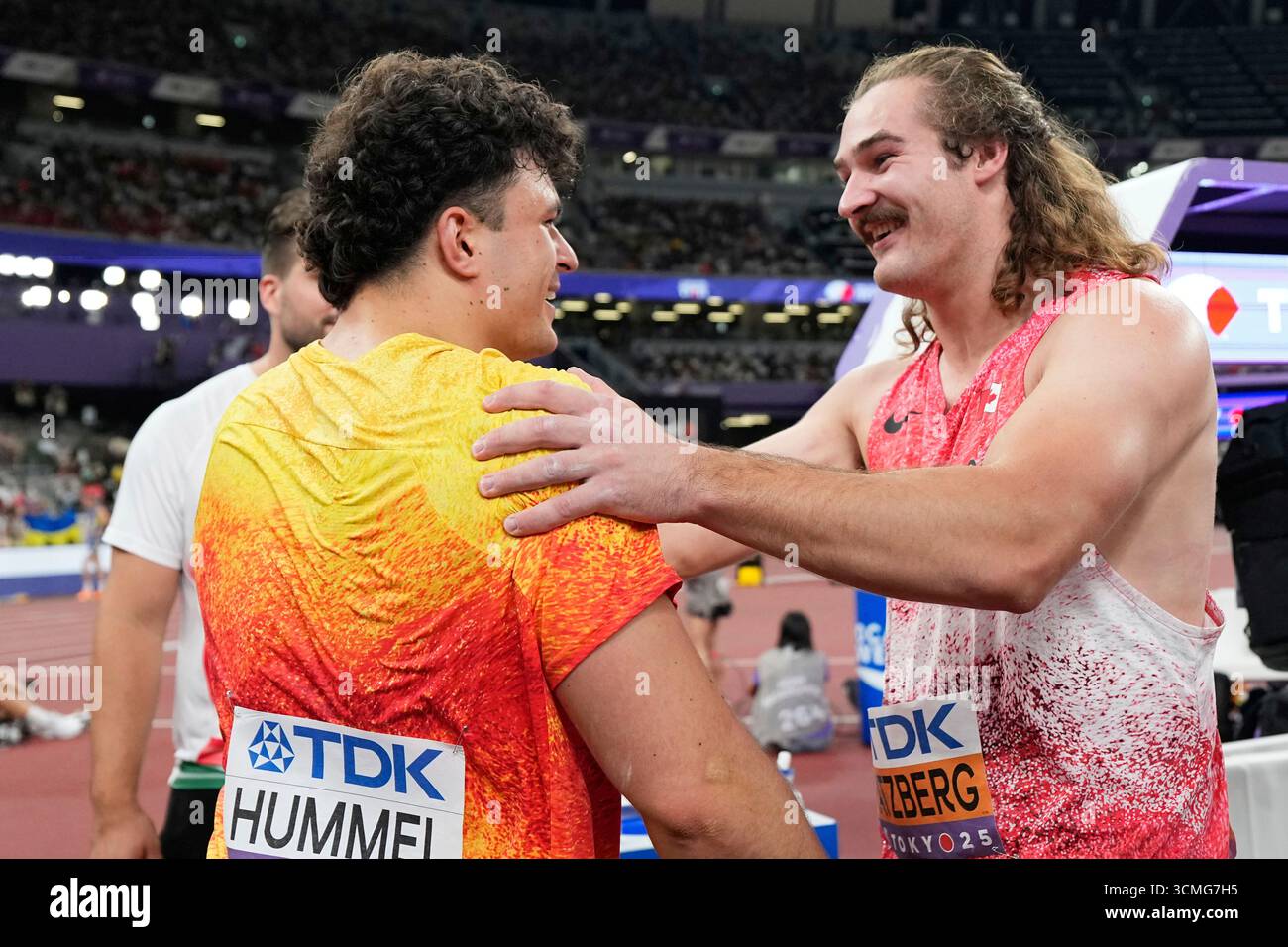 Gold medalist Canada's Ethan Katzberg, right, talks to silver medalist ...