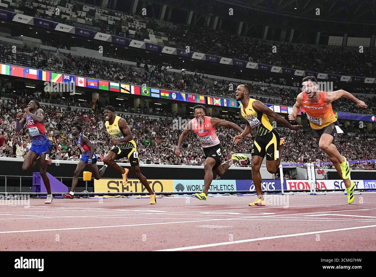 Athletes cross the finish line in the men's 110-meter hurdles final at ...