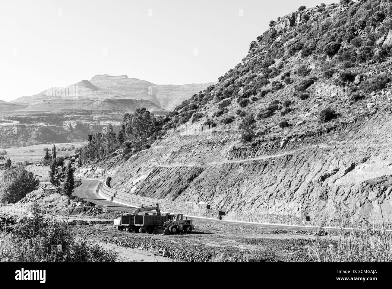 Ha Hlosi, Lesotho - May 4, 2025: Construction equipment next to road ...