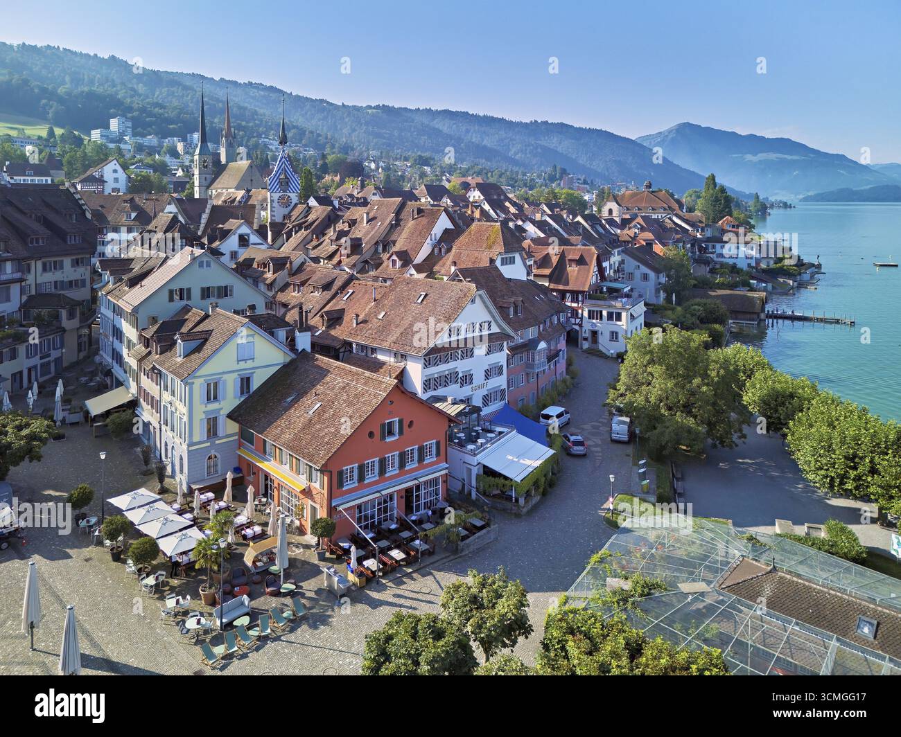 Old town with the Landsgemeindeplatz surrounded by street cafes and ...