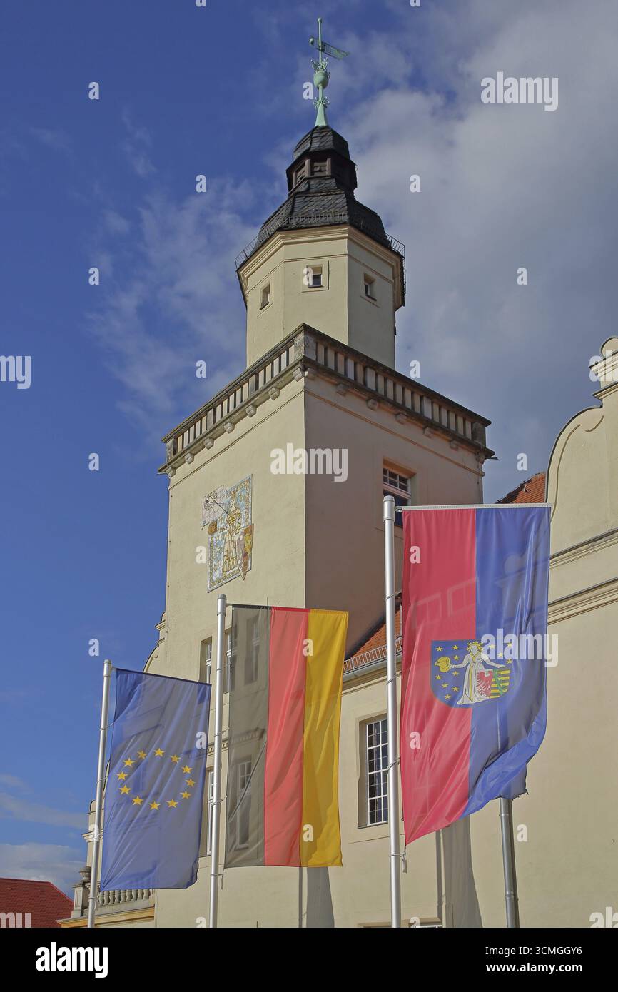 Renaissance town hall with EU flag, German national flag and town flag ...