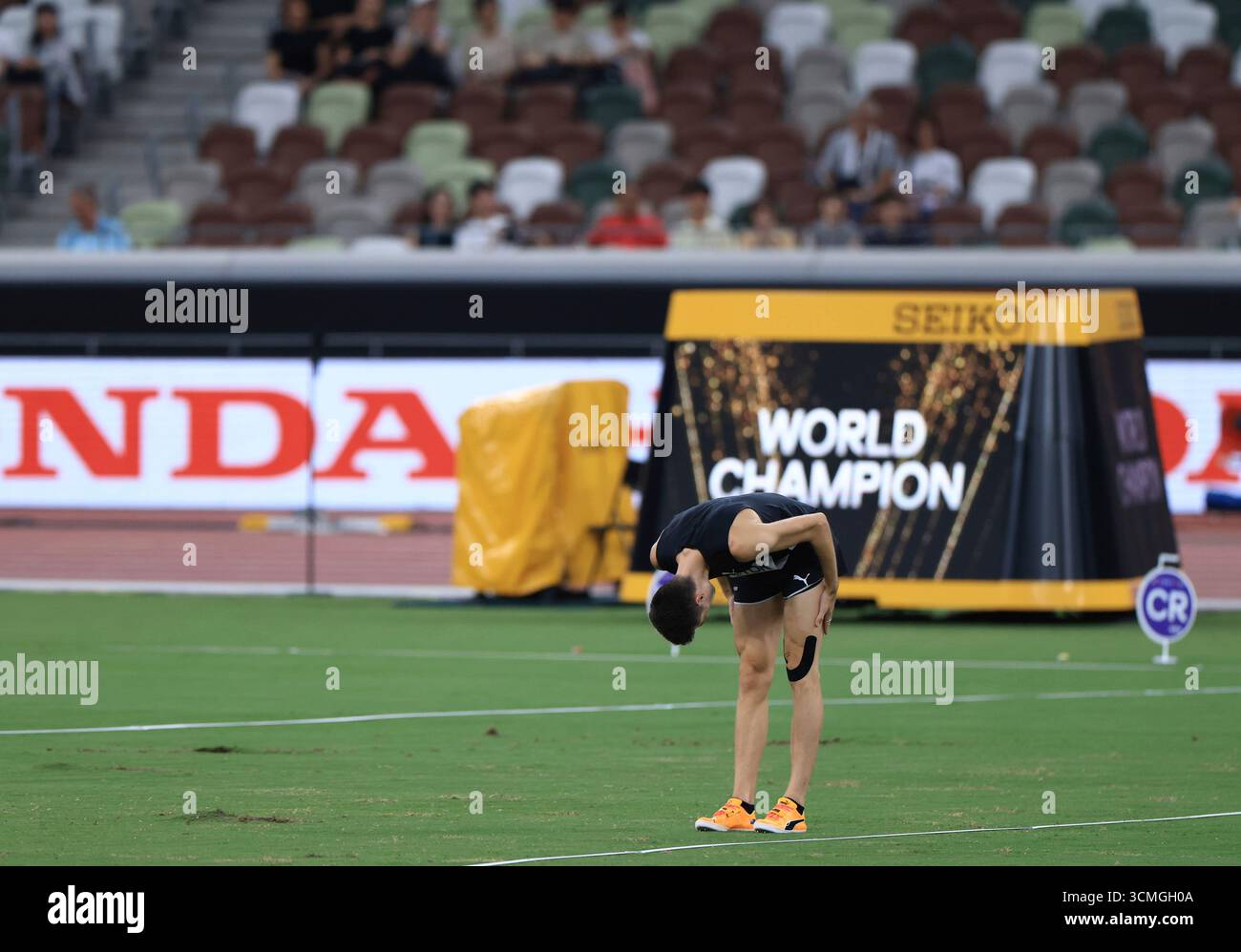 Hamish KERR of New Zealand bows after winning the Men's high jump final ...