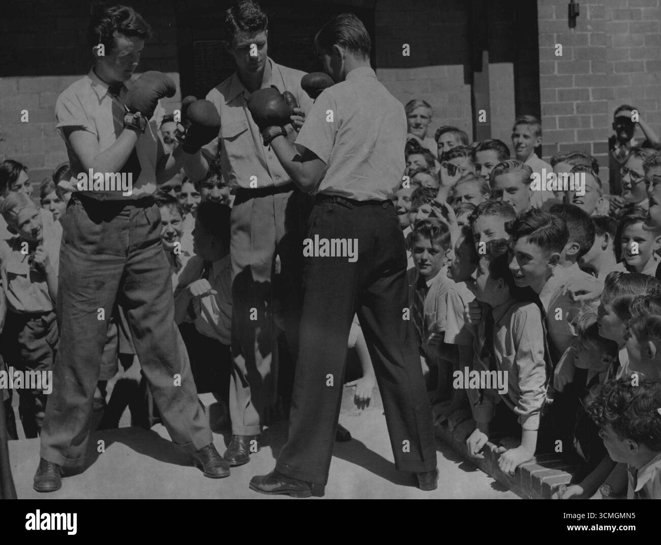 Empire welter weight champion, New Zealander Barry Brown (Center ...