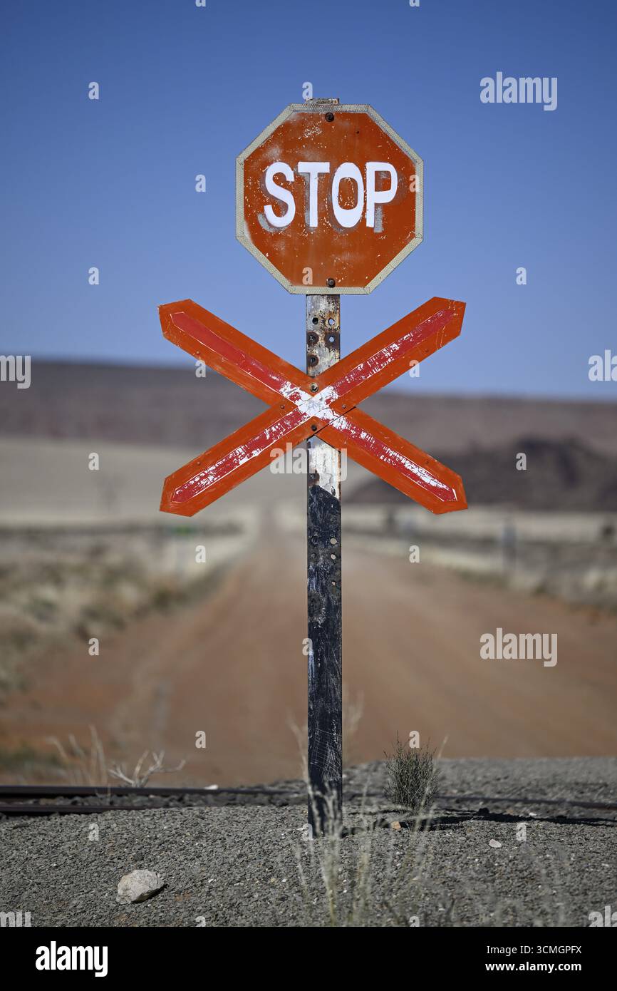 Stop sign at an ungated level crossing on the Luederitz-Keetmanshoop ...