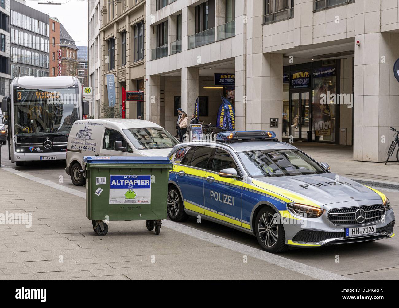 Bus and police vehicle in Grosser Burstah, Hamburg, Germany Stock Photo ...