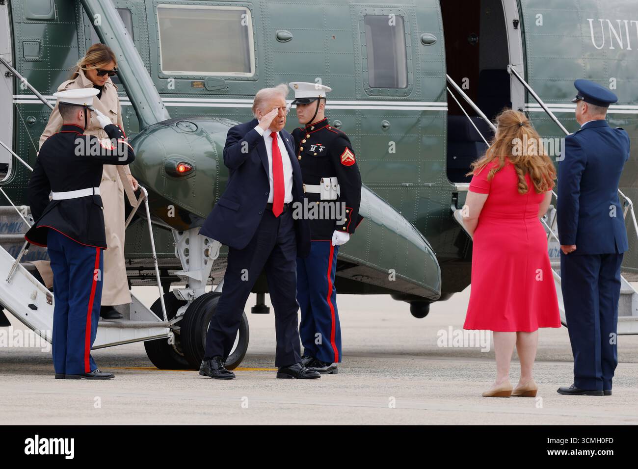 President Donald Trump, center, and first lady Melania Trump, top left ...