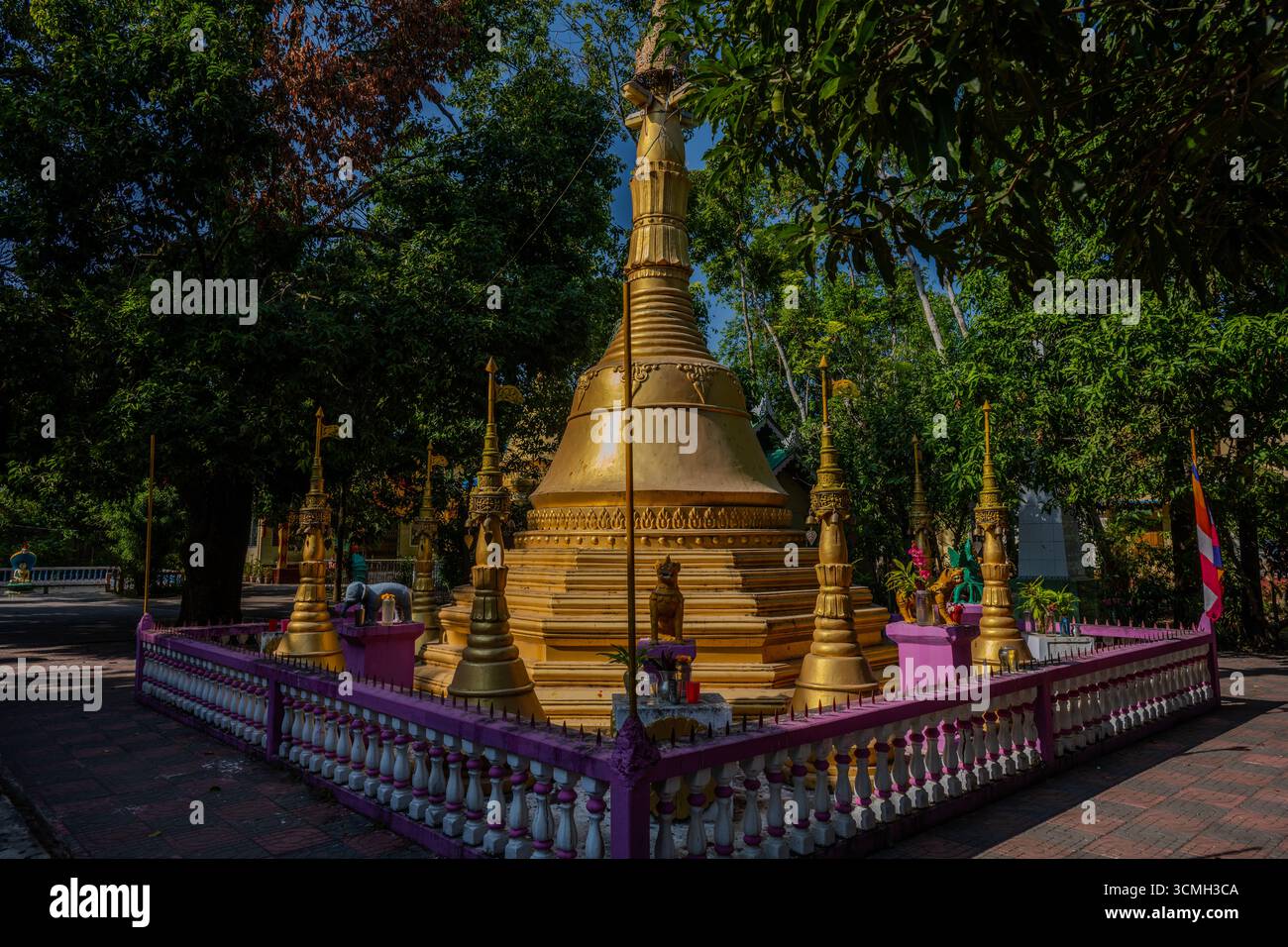 Golden Buddhist Stupa Surrounded by Lush Greenery at Moheskhali Upazila ...