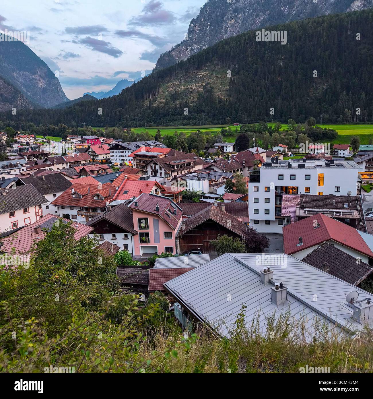 Evening atmosphere above the old town centre of Oetz in the Oetz Valley ...