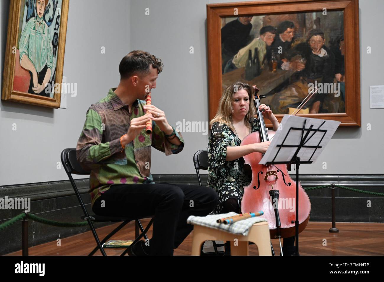 Cellist Nina Plapp performing at the national gallery a new piece of ...