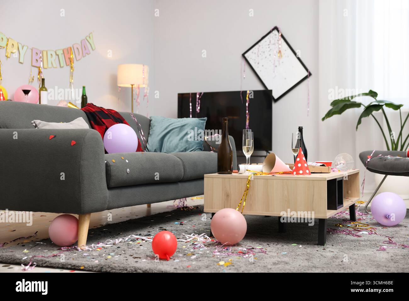 After the party champagne bottle table hi-res stock photography and ...