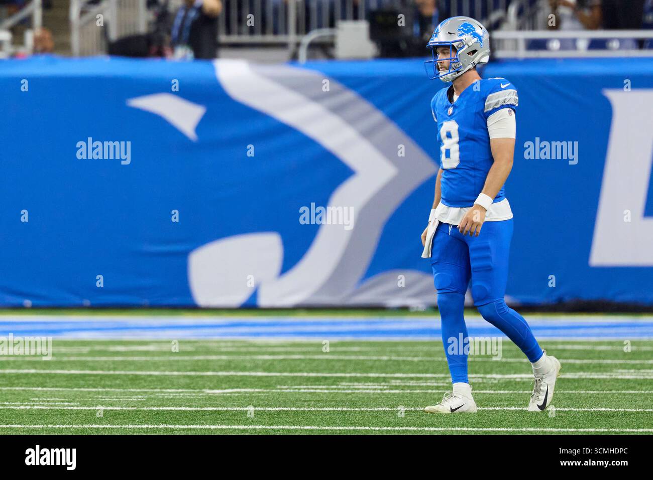 Detroit Lions quarterback Kyle Allen (8) walks on the field against the ...