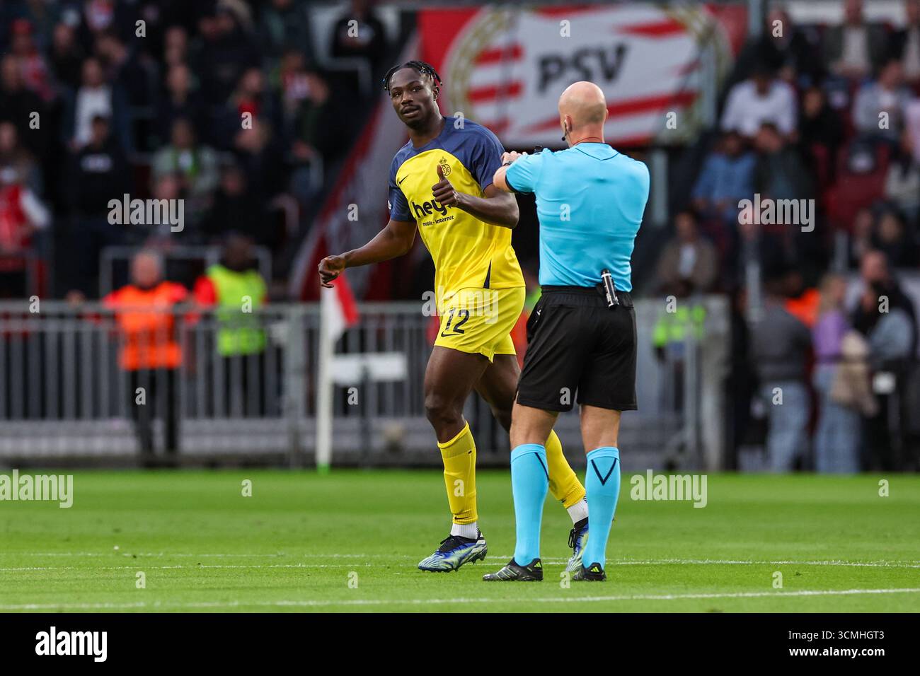 EINDHOVEN, NETHERLANDS - SEPTEMBER 16: Referee Anthony Taylor talks to ...