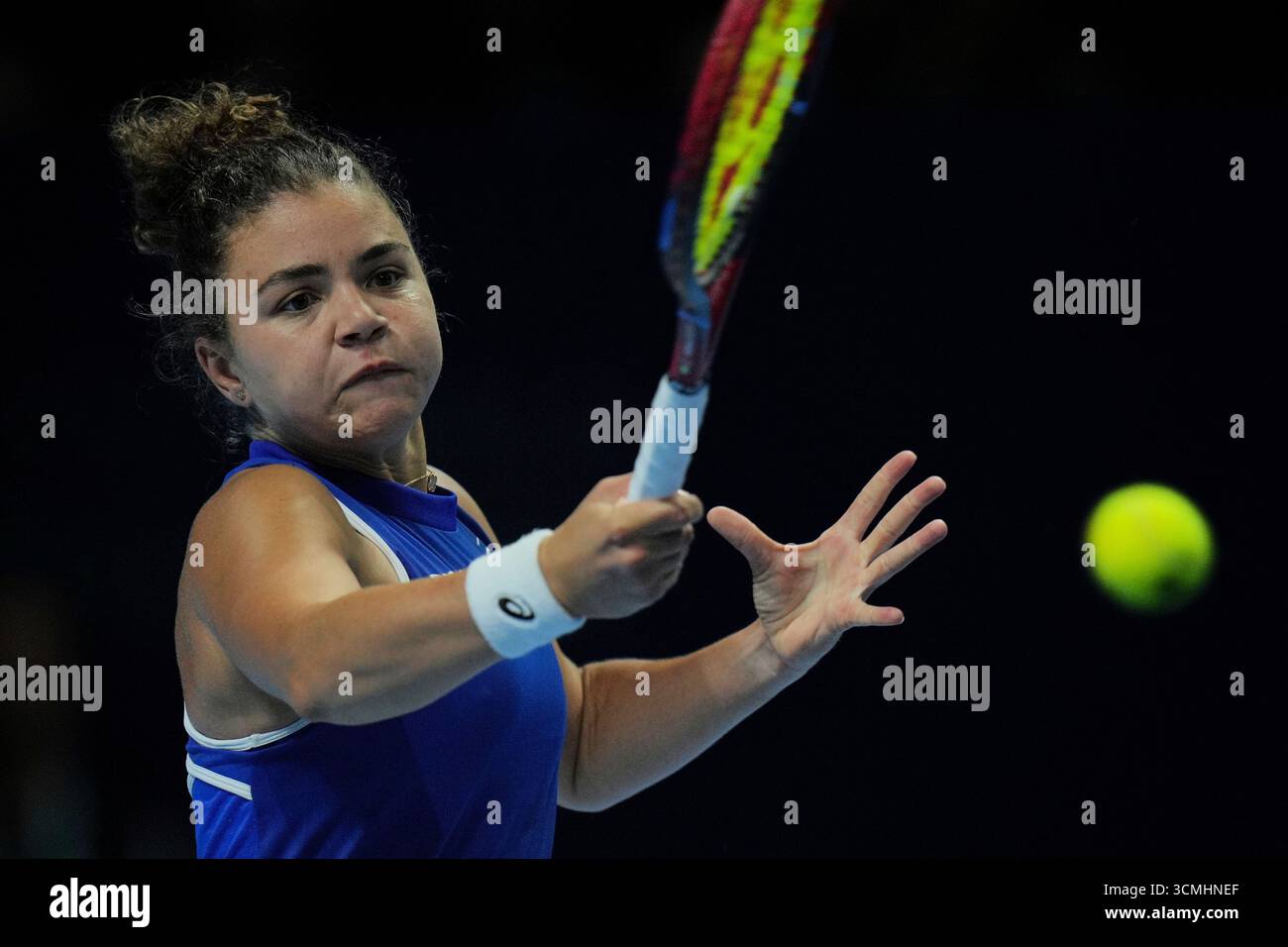 Jasmine Paolini, of Team Italy returns a forehand shot to Wang Xinyu ...